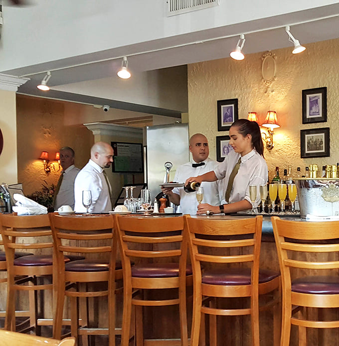 The attentive staff prepares for service with the kind of precision and care that ensures every guest receives the exceptional experience Hemmingway's Bistro is known for.