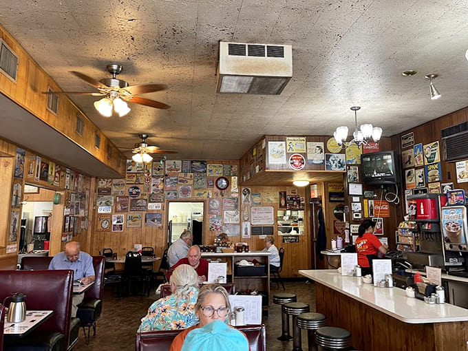 Vintage signs and memorabilia cover every surface, creating a nostalgic atmosphere that enhances every visit.