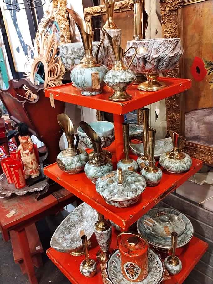 Decorative porcelain pieces gleam from their displays, showcasing the kind of everyday beauty that people once surrounded themselves with as a matter of course.