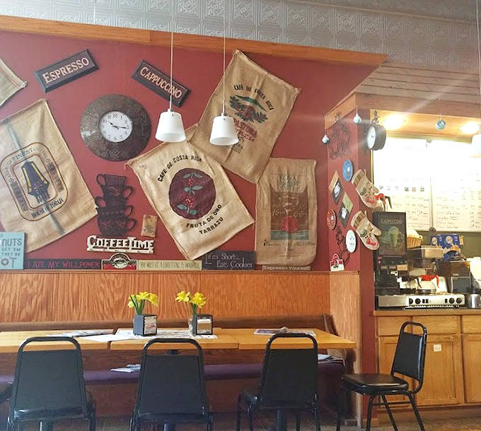 Coffee-themed decorations and burlap sacks create a cozy atmosphere that invites you to linger over that second cup and maybe one more donut.