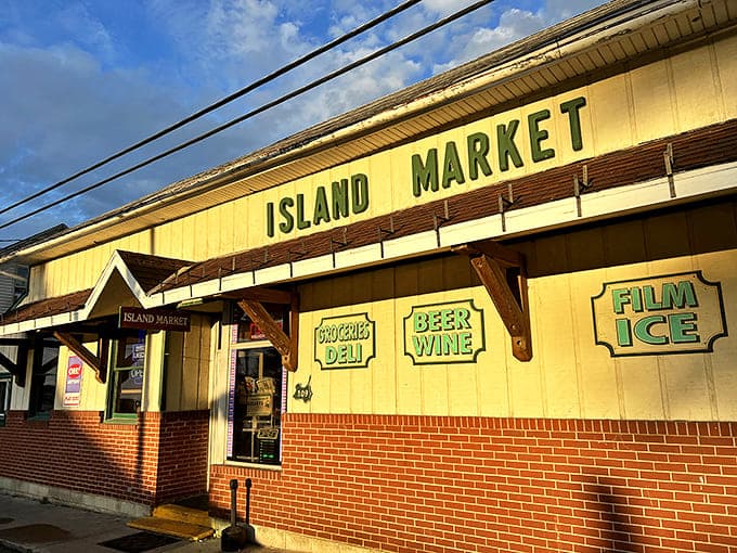 Island Market: The yellow-fronted general store where forgotten sunscreen and last-minute dinner ingredients come with a side of local news.