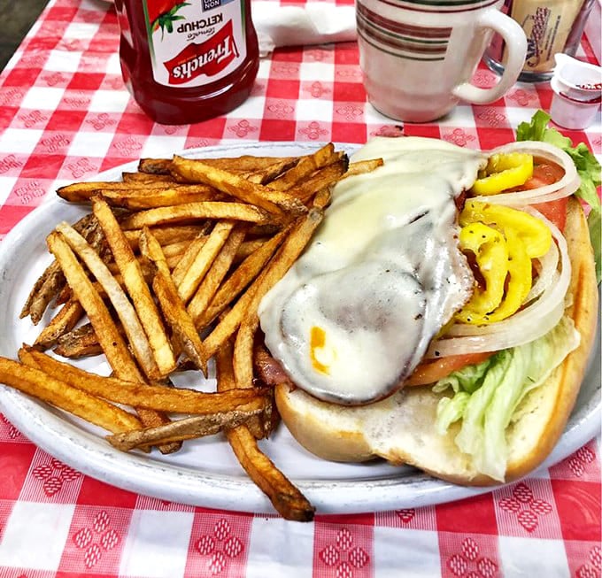 This isn't just a sandwich – it's architectural genius with layers of flavor held together by perfect bread.