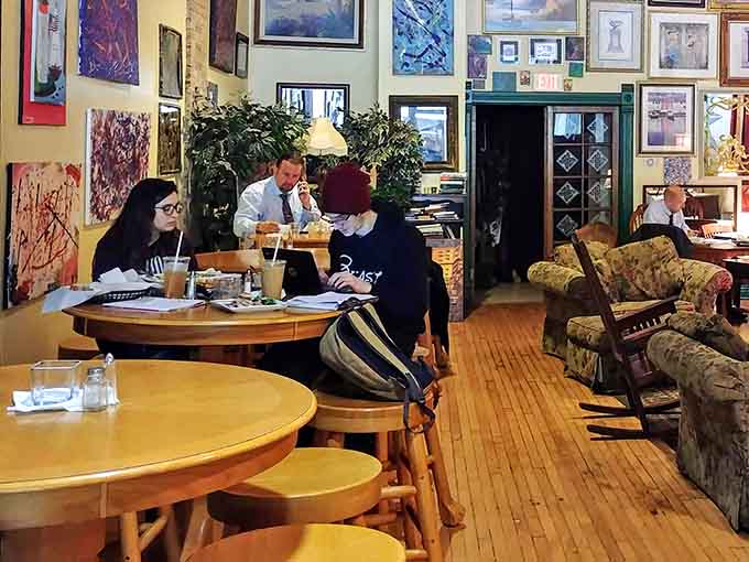 Locals gather around wooden tables like it's the most natural thing in the world, because at Jitters, it is.