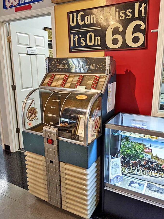 The jukebox glows in the corner, ready to provide the soundtrack for your impending food coma or triumphant burger victory.