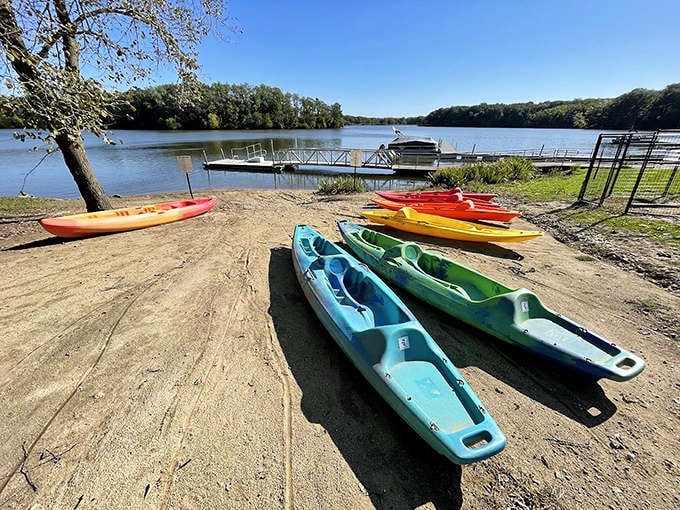 A rainbow of kayaks awaits adventure-seekers. Like choosing from nature's own candy store of water fun.