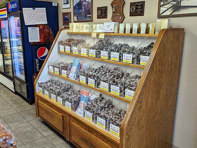 A wooden display showcasing treats wrapped and ready, organized with the kind of care that tells you these folks take their baking seriously.
