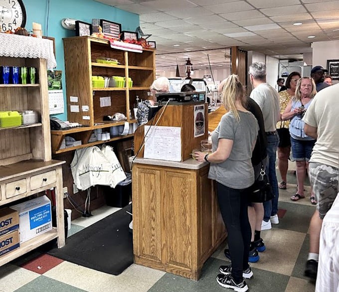The line at the counter moves steadily as people eagerly await their turn at comfort food heaven inside.