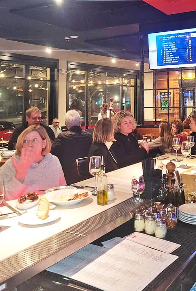 The bar from another angle reveals even more reasons to settle in for a leisurely evening.