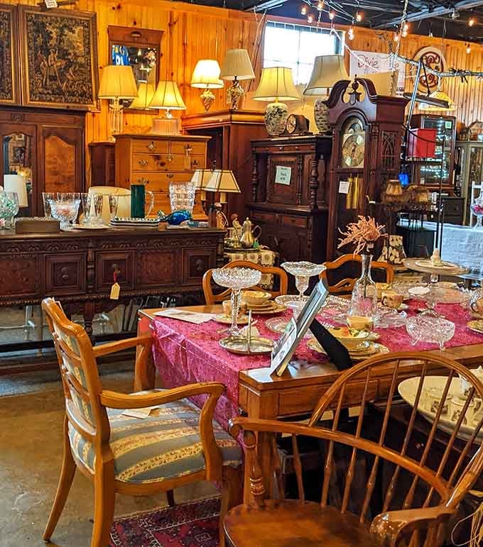 This dining setup looks ready to host a dinner party where mismatched chairs are considered charming rather than a decorating mistake.