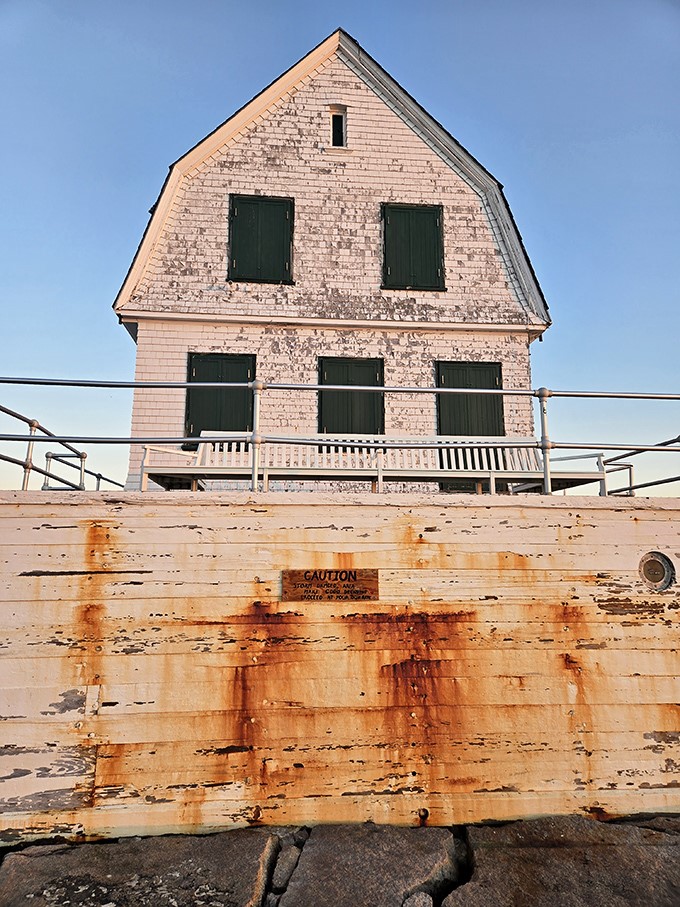 Up close, you can appreciate the lighthouse's sturdy construction and practical design, built to withstand Maine's harshest coastal conditions.