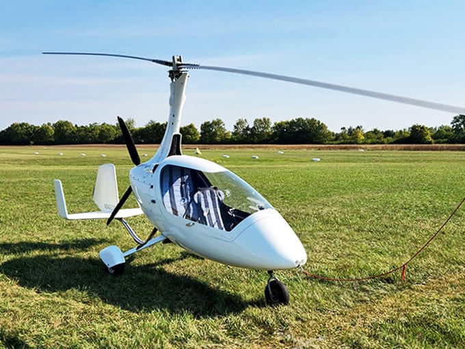 Modern meets vintage at WACO Field &ndash; this sleek Magni M24 Orion gyrocopter shares runway space with aircraft from aviation's earliest chapters.