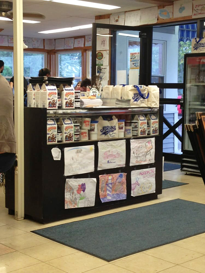 The merchandise wall &ndash; because sometimes you need a Jordan's t-shirt to remember where you had the breakfast that ruined all other breakfasts.