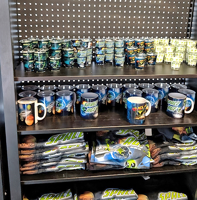 Take home a piece of the galaxy with Space Age merchandise &ndash; because sometimes a t-shirt is the best souvenir from interstellar dining adventures.