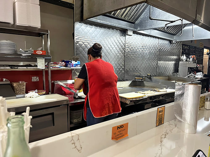 Behind-the-scenes action where skilled hands turn simple ingredients into extraordinary meals every single day.