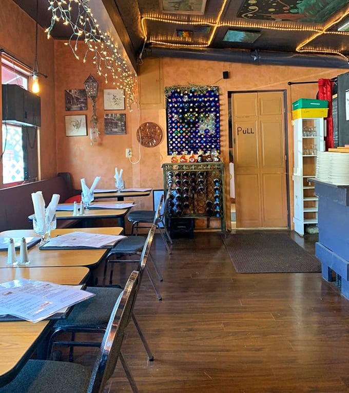 Eclectic decor and bottle displays give this dining room character that chain restaurants can only dream about.