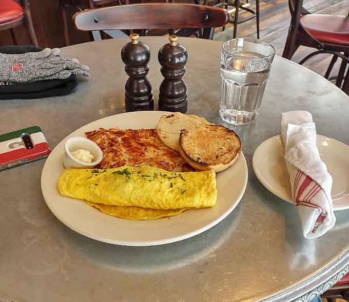 An omelet so fluffy it practically levitates off the plate, filled with your choice of ingredients and cooked to golden perfection.