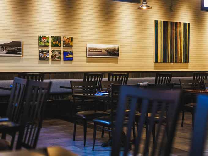 The main dining area balances intimacy with openness, giving diners enough space to feel comfortable without feeling isolated from the energy around them.