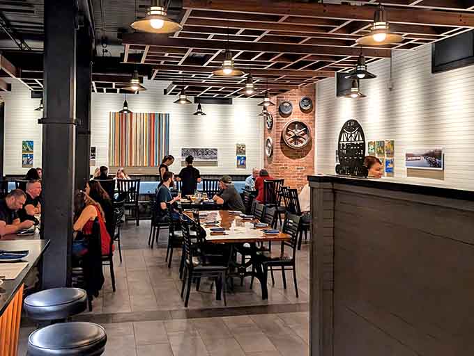 The universal expression of diners enjoying truly excellent food, captured in its natural habitat.