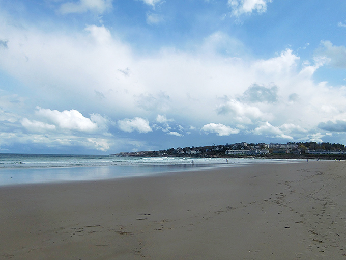Three miles of sandy perfection stretch toward the horizon, where the rhythm of Atlantic waves provides nature's most soothing soundtrack.