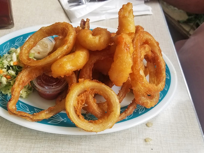 Crispy, golden halos of happiness. It's like someone deep-fried Saturn's rings and served them with a side of joy.