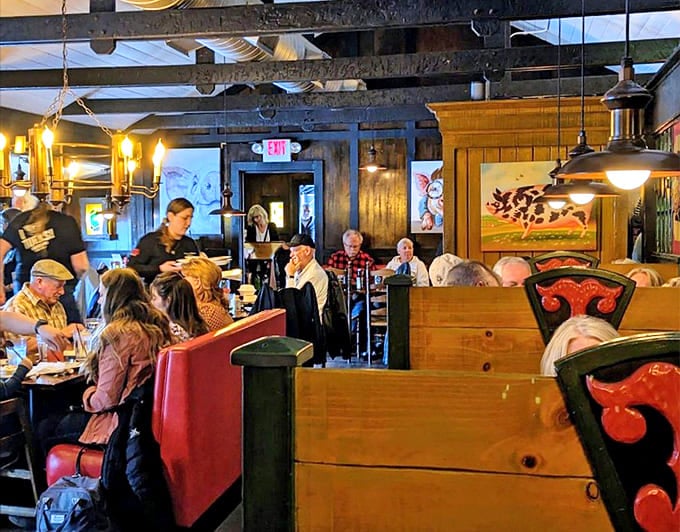 Another angle reveals the eclectic decor and warm lighting that creates intimate spaces perfect for conversations and memorable meals together.