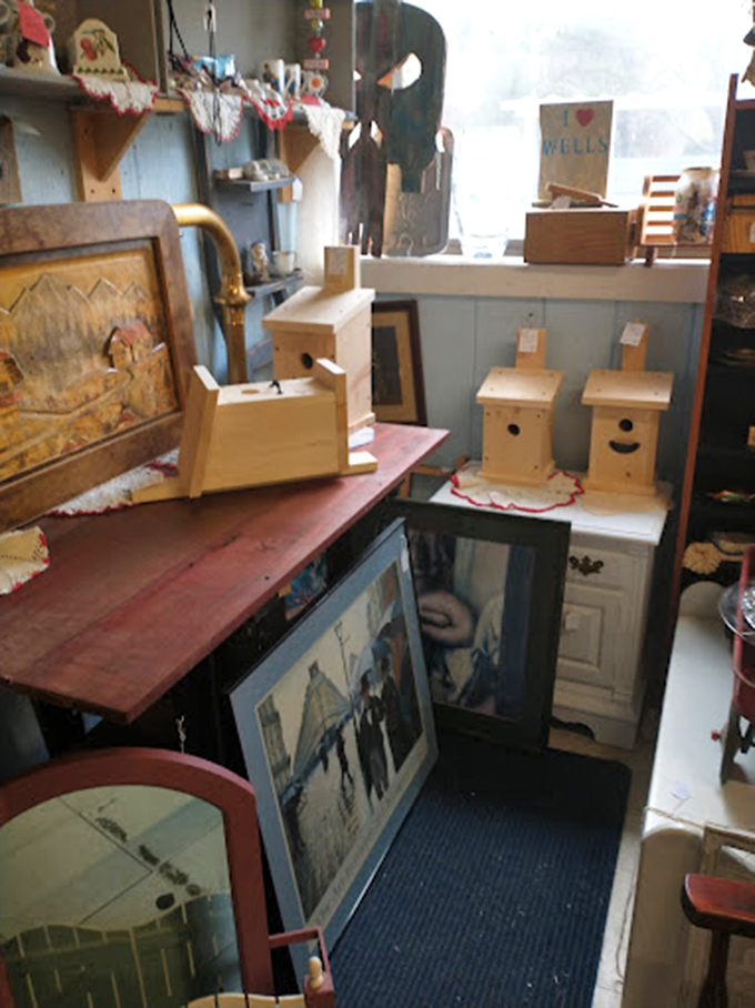 A cozy nook filled with birdhouses and artwork feels like discovering your grandmother's favorite reading corner.