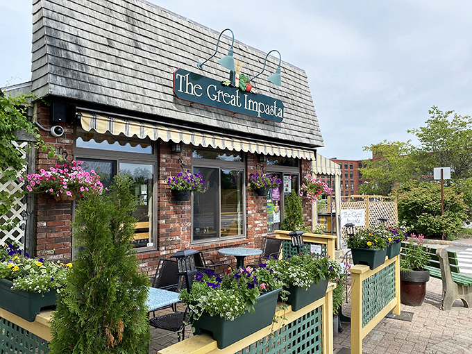 Outdoor seating surrounded by flowers and greenery offers the perfect summer spot to twirl pasta while soaking up Brunswick's charm.