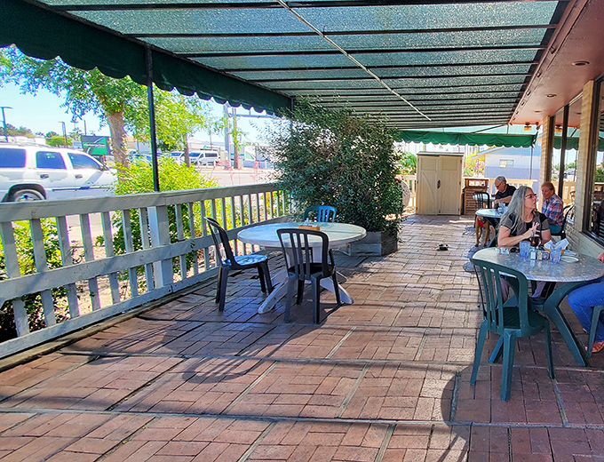 Dappled sunshine, gentle breezes, and the perfect outdoor setting for contemplating whether to order seconds or simply move in permanently.