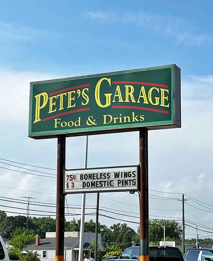 The Pete's Garage sign stands as a beacon to hungry travelers, promising automotive nostalgia and culinary satisfaction just off the highway.