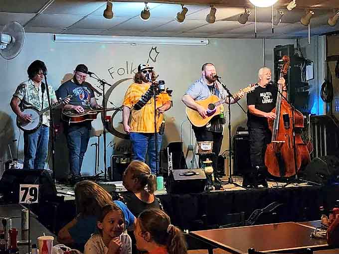 Weekend evenings bring local musicians who transform the cafe into a concert venue where bluegrass, folk, and acoustic melodies complement the culinary offerings.