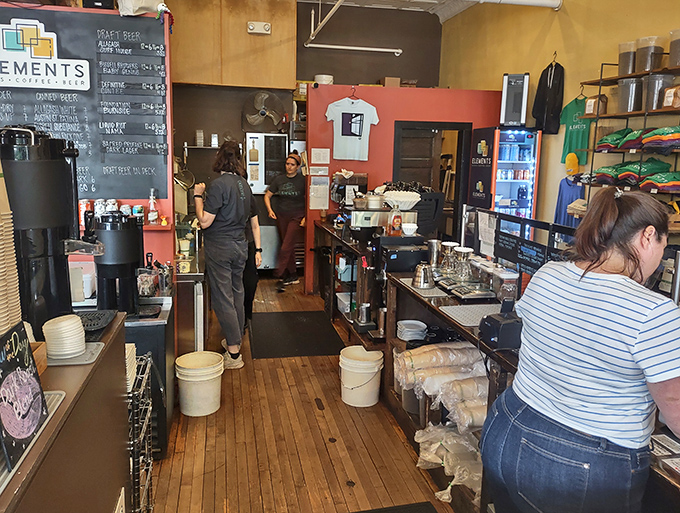 The counter area buzzes with activity as baristas craft drinks with the precision of scientists and the flair of artists.