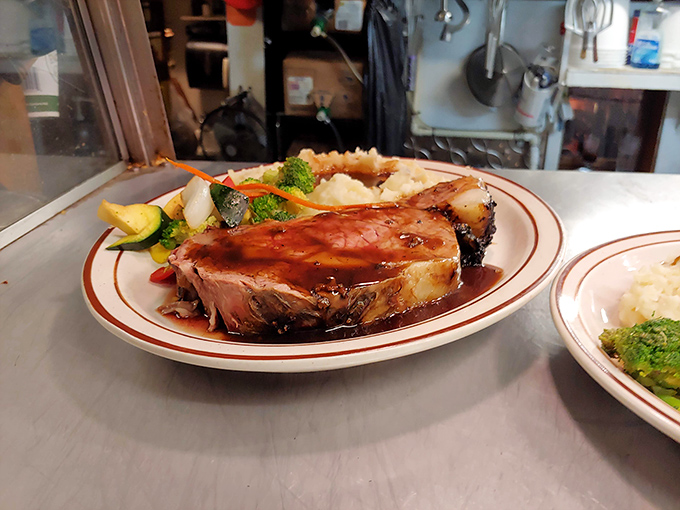 Prime rib that's been slow-roasted to pink perfection, its juices mingling with savory au jus &ndash; Sunday dinner elevated to an art form.