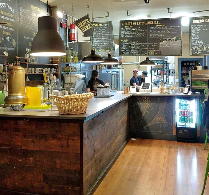 Behind the counter, the heart of the operation hums with activity as staff craft each order with care and genuine enthusiasm.