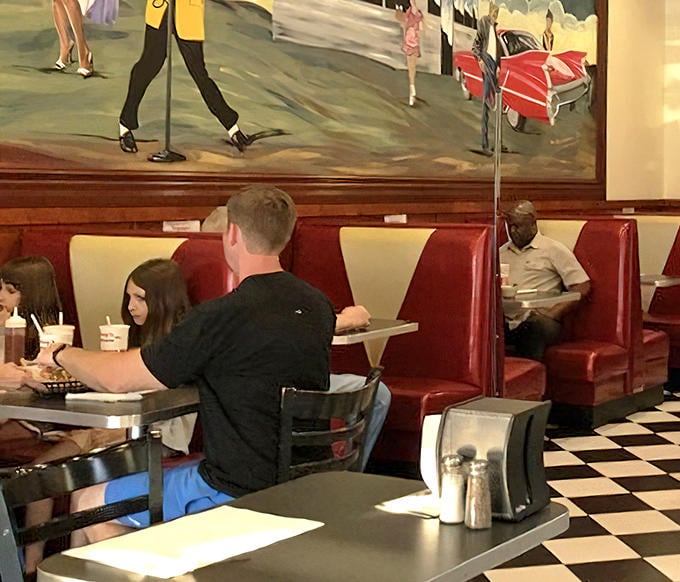 Diners settle into those comfortable booths for meals that often turn into extended conversations, because good food deserves to be savored slowly.
