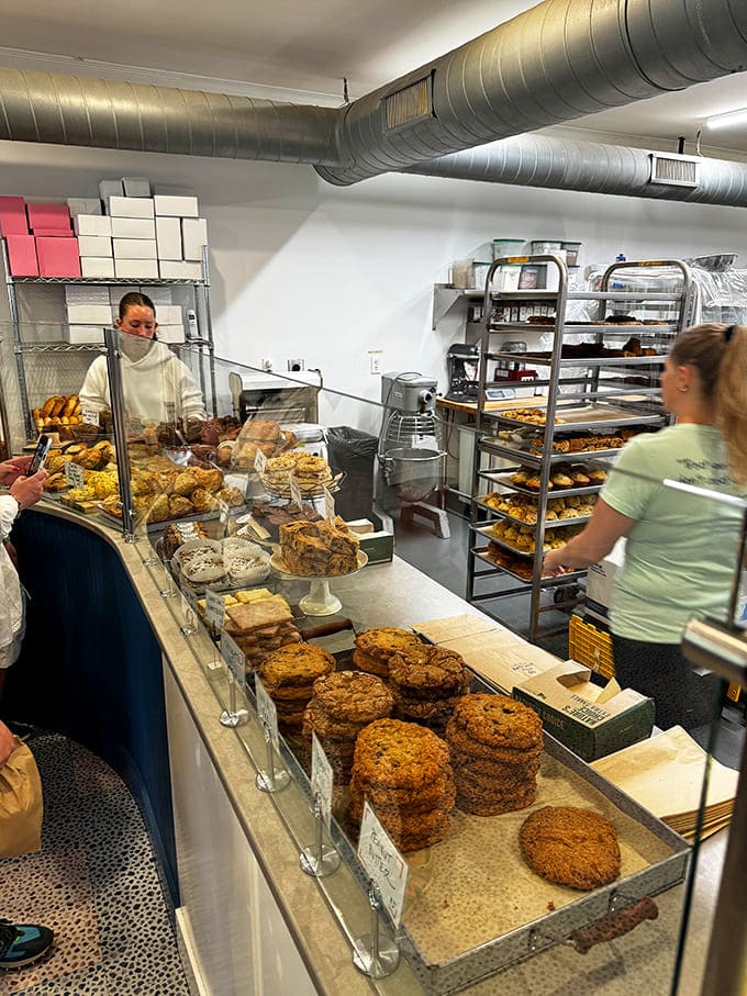 Another angle of the service area reveals the impressive array of fresh pastries and baked goods that make choosing just one item nearly impossible.
