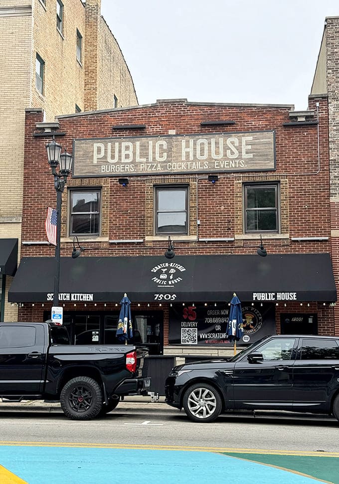 Colorful outdoor seating provides the perfect spot for enjoying your meal al fresco, complete with string lights that make everything feel like a celebration.