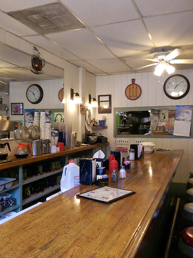 Vintage charm meets practical functionality at this counter where regulars have claimed their favorite spots for years.