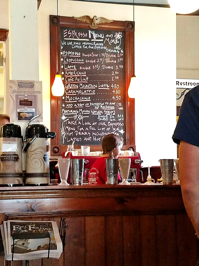 The espresso bar's chalkboard menu promises caffeinated bliss with locally roasted beans. That vintage eagle carving has witnessed thousands of morning coffee rituals.