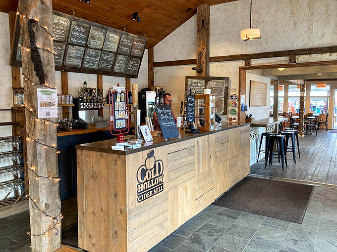 The tasting bar where cider dreams come true &ndash; rustic wood meets modern service in a space designed for lingering conversations and spontaneous purchases.