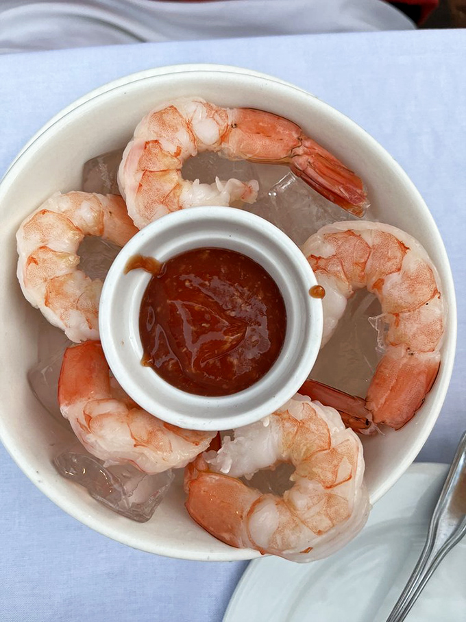 The shrimp cocktail arrives on a bed of ice&mdash;plump, perfectly cooked crustaceans surrounding a zesty cocktail sauce.