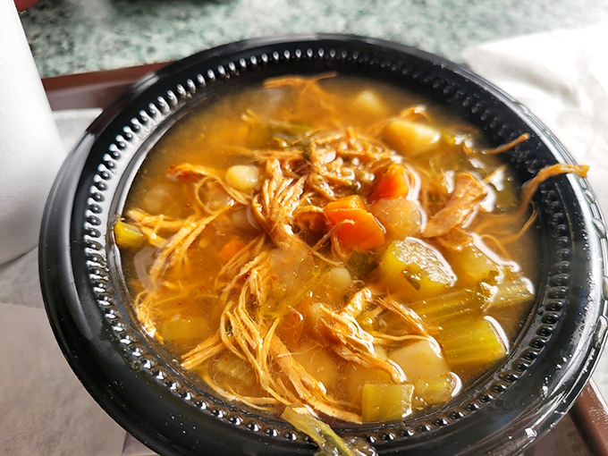 A bowl of liquid comfort! This soup looks like it could warm you up faster than a bear hug from your grandma.