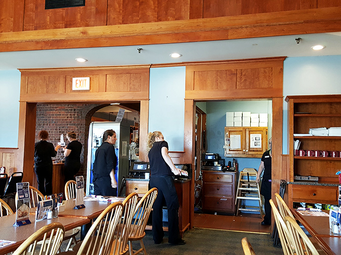 The unsung heroes of Governor's experience, moving with practiced efficiency while maintaining that genuine Maine friendliness.