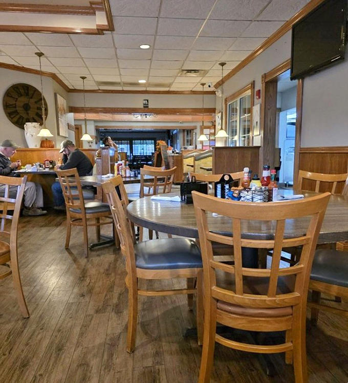 Comfortable seating and warm lighting create an atmosphere where lingering over breakfast feels not just acceptable but encouraged and celebrated.