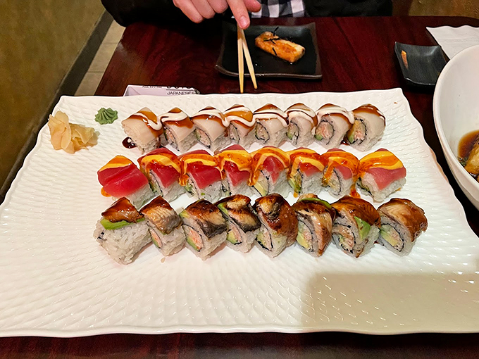 Three rows of sushi perfection tell a delicious story&mdash;from classic salmon to creative specialty rolls, each one more tempting than the last.