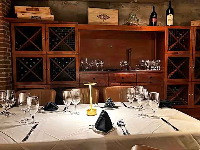 A private dining table awaits its guests, promising an evening of culinary magic in an intimate setting.