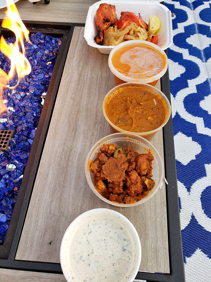 Fire and ice, Milwaukee style! This spread's hotter than a Harley exhaust, cooled down with a side of creamy raita. Yum-cycle, anyone?