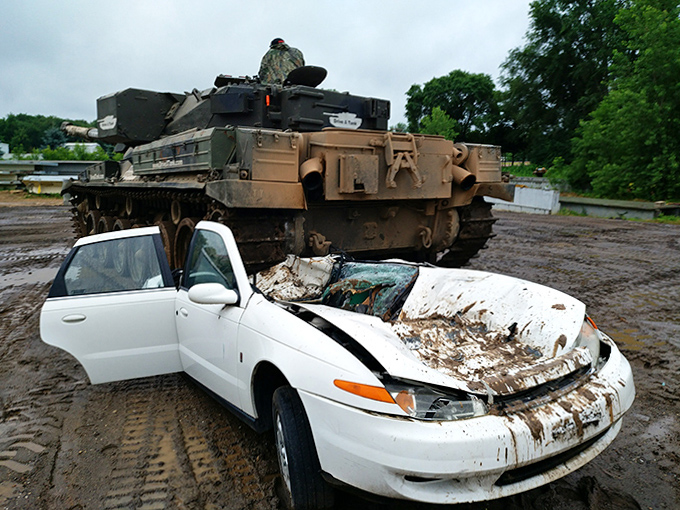 Woodland warrior: A tank emerges from the tree line, demonstrating the surprising stealth of these massive vehicles in natural settings.