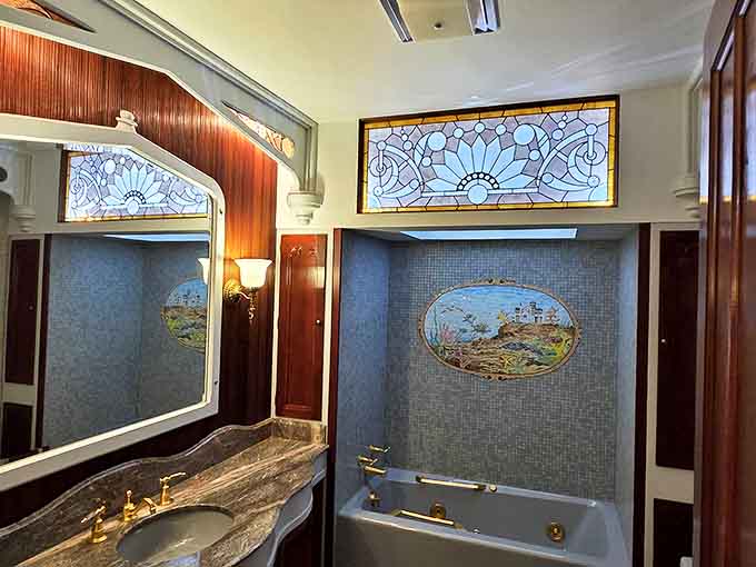 Stained glass transforms an ordinary bathroom into a sanctuary of colored light &ndash; proving Victorians believed even practical spaces deserved beauty.