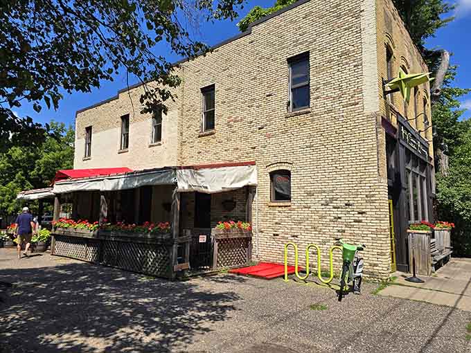 The exterior shows off its historic bones while the patio furniture hints at warm weather dining that's worth planning your day around.