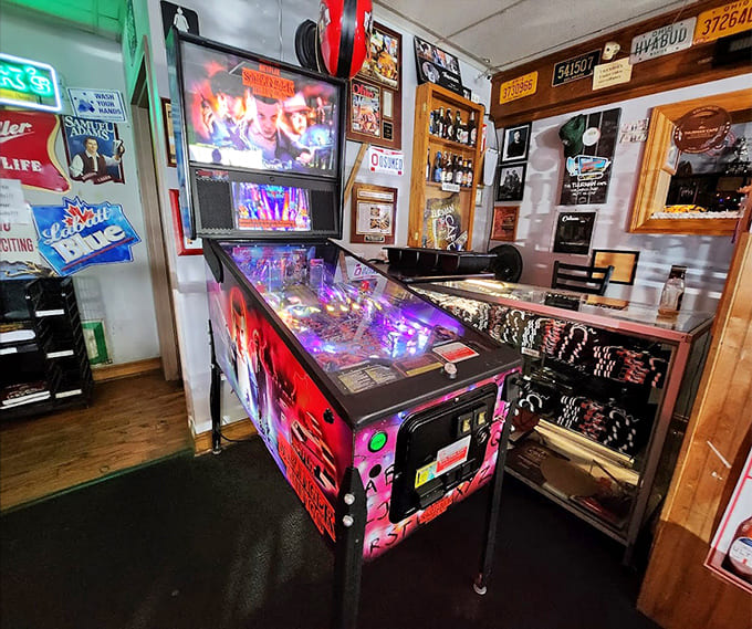 A pinball machine stands ready to entertain, because sometimes you need to work off nervous energy while waiting for your food.